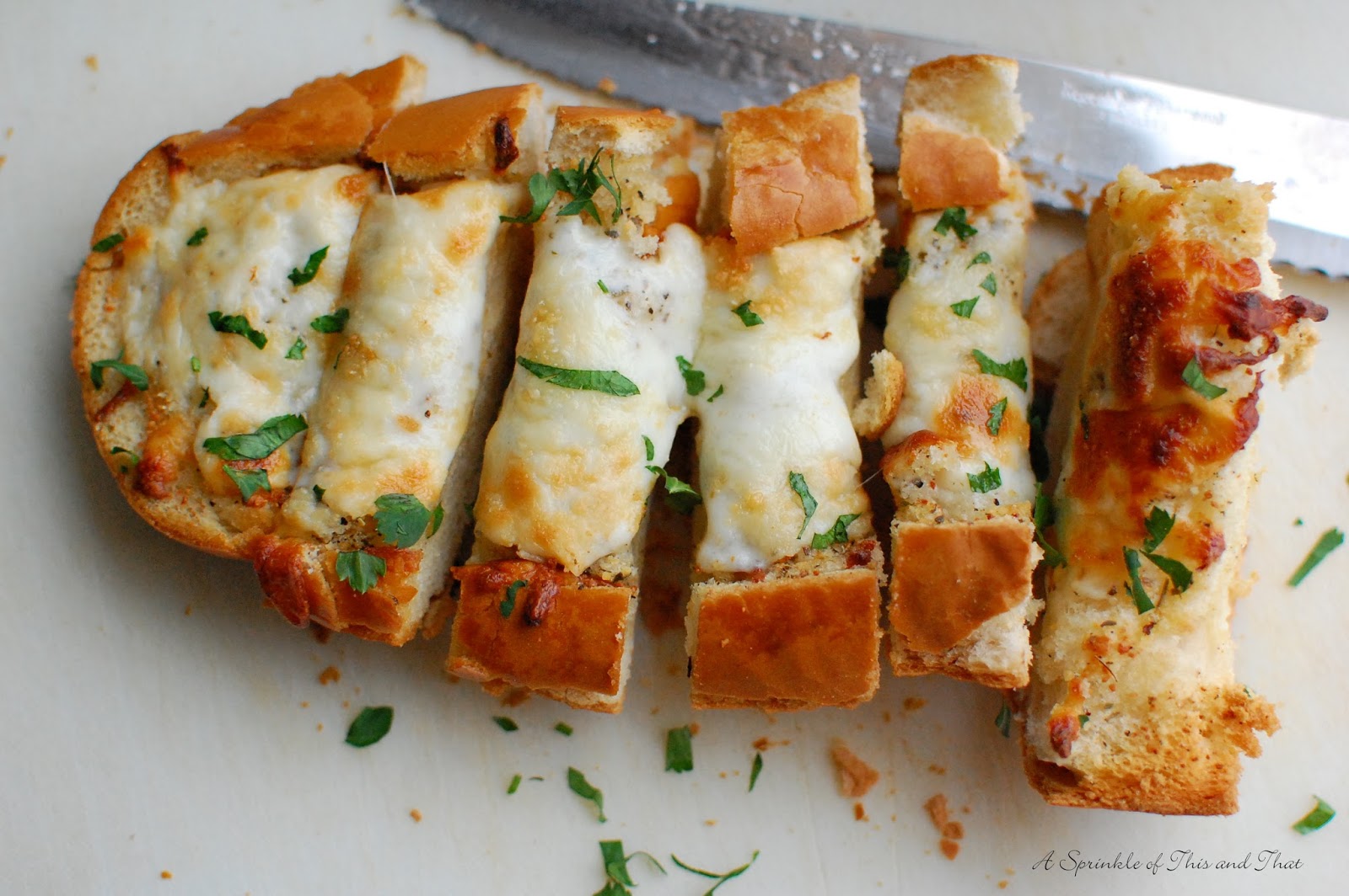 A Sprinkle of This and That: Cheesy Garlic Bread
