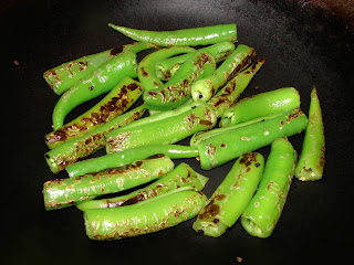 Stir fried blistered green chilli 虎皮尖椒