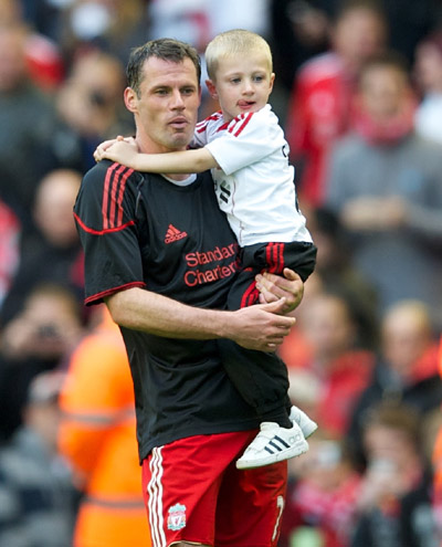 Celebrity Beach Bowl: Jamie Carragher with his son James at Anfield