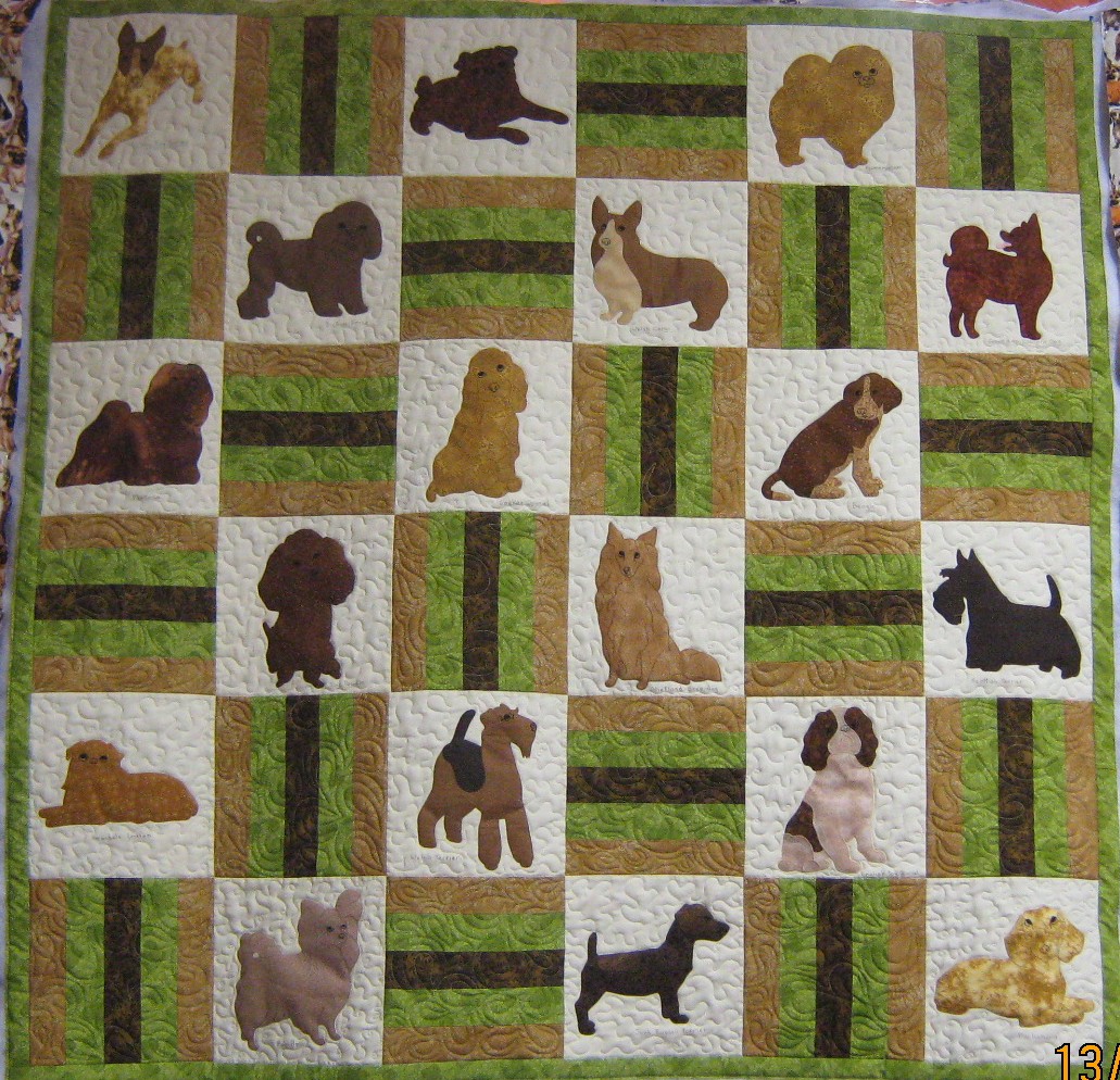 quiltmekiwi: panel quilts, appliqued dogs,and a thought?