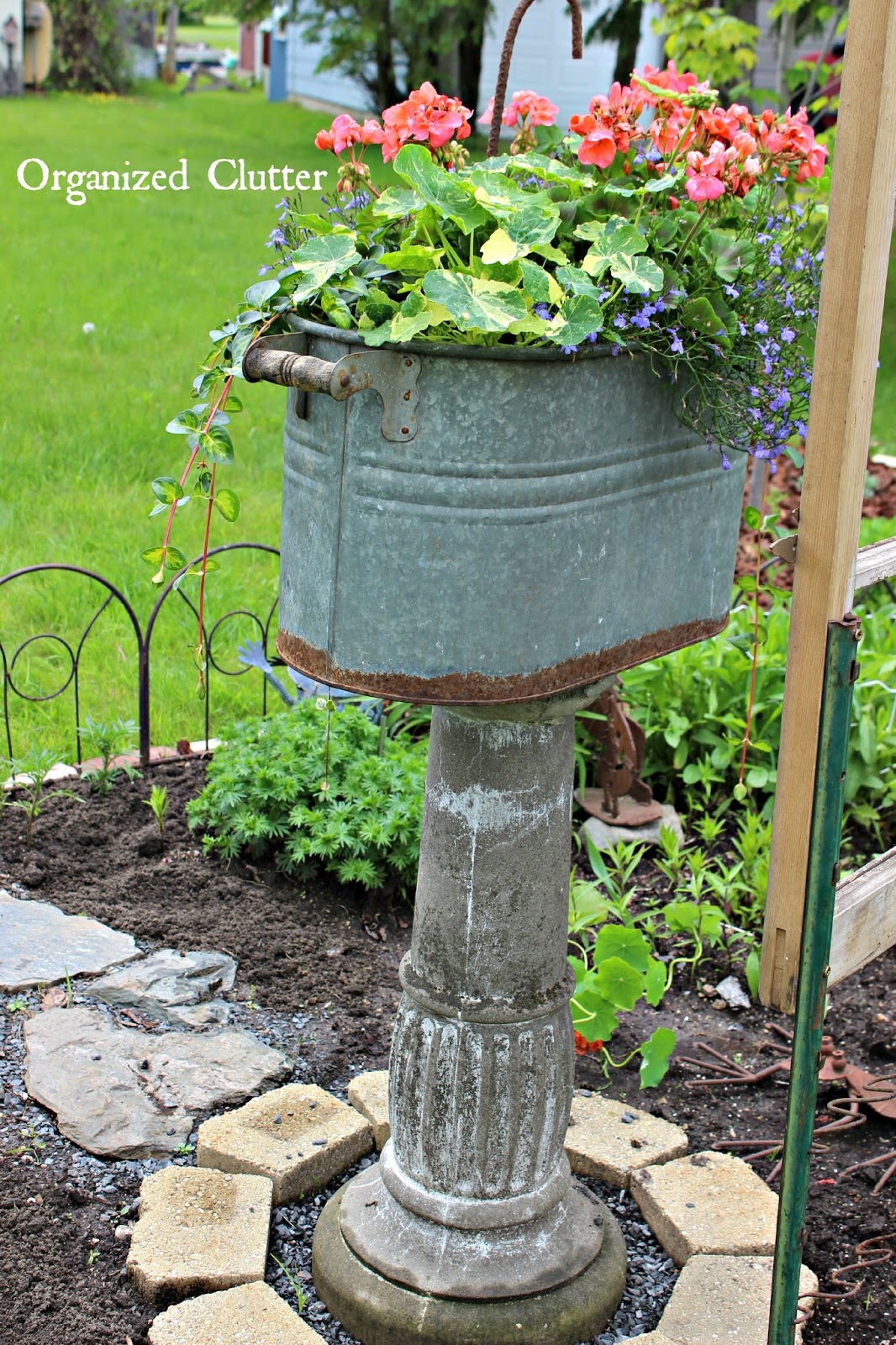 How To Add Vertical Interest to the Flower Garden - Organized Clutter