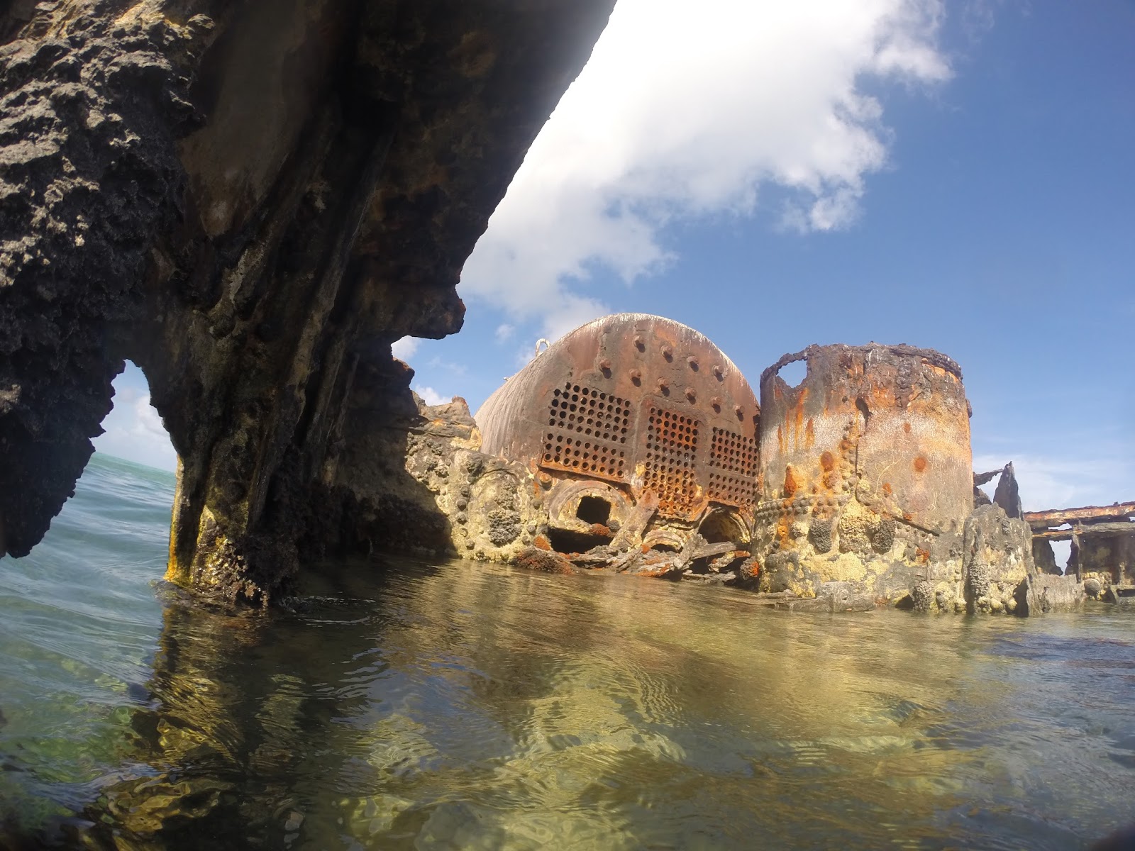 SV FLUENTA : Butaritari in Pictures - Thatch, WWII Relics and Kids.