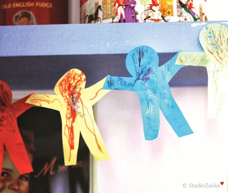 StudioZakka: DIY'tje slinger van papieren poppetjes...