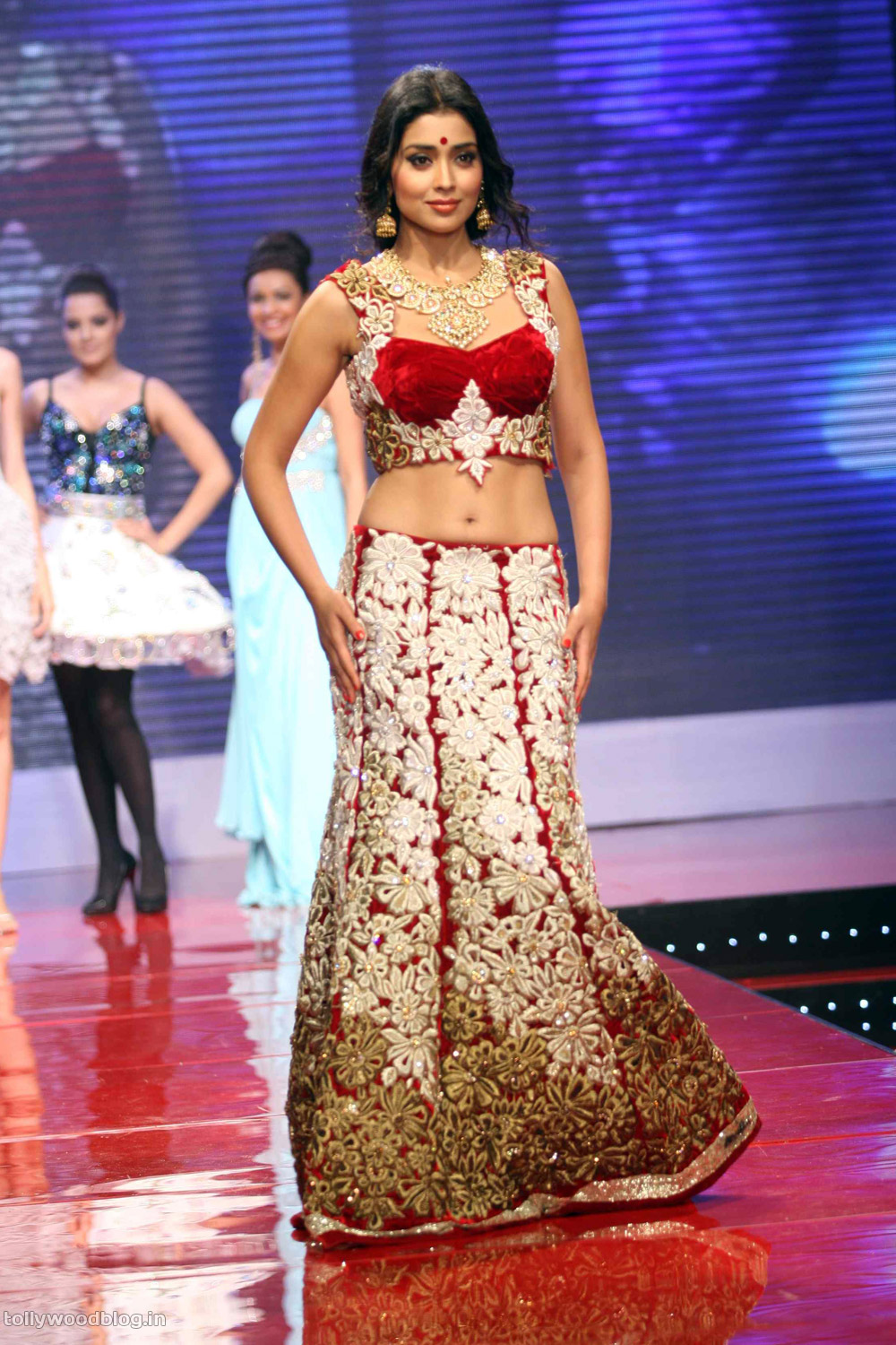 Shriya Saran Hot Ramp walk in Red Tradition Dress