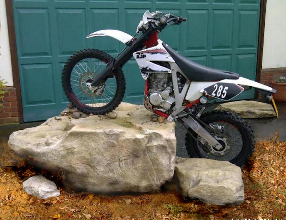 All about plants and planters: Real bike, fake rocks.