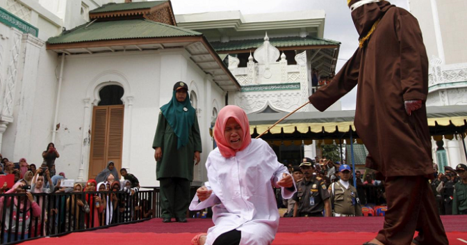 WTF! MUSLIM LADY MERCILESSLY FLOGGED 23 STROKES OF CANE FOR STANDING ...