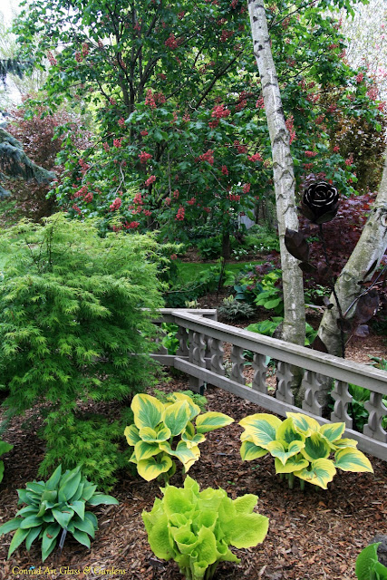 Conrad Art Glass & Gardens: Every garden needs a little glue...