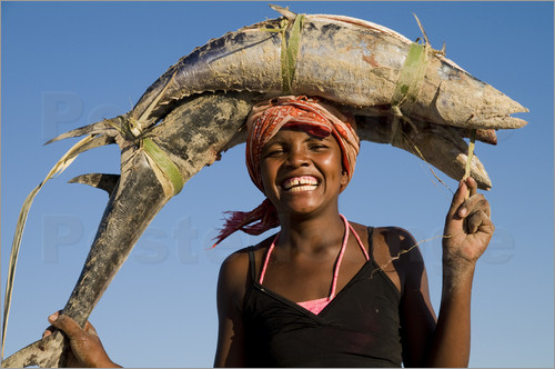 Just Watching the Wheels Go Round: Woman with fish on head?