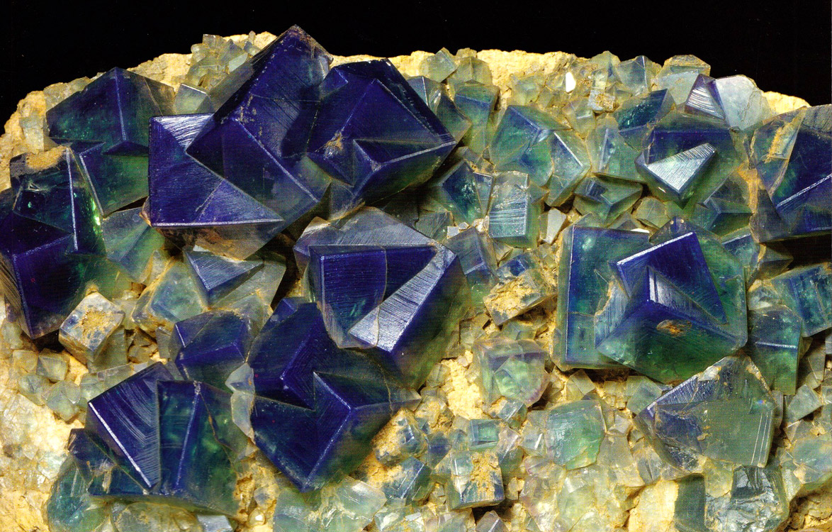 '18 : Cluster of Cubo-octahedral Fluorite Crystals of Deep Raspberry Purple