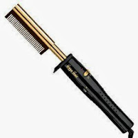 The hair comb: The hot comb/ straightening comb