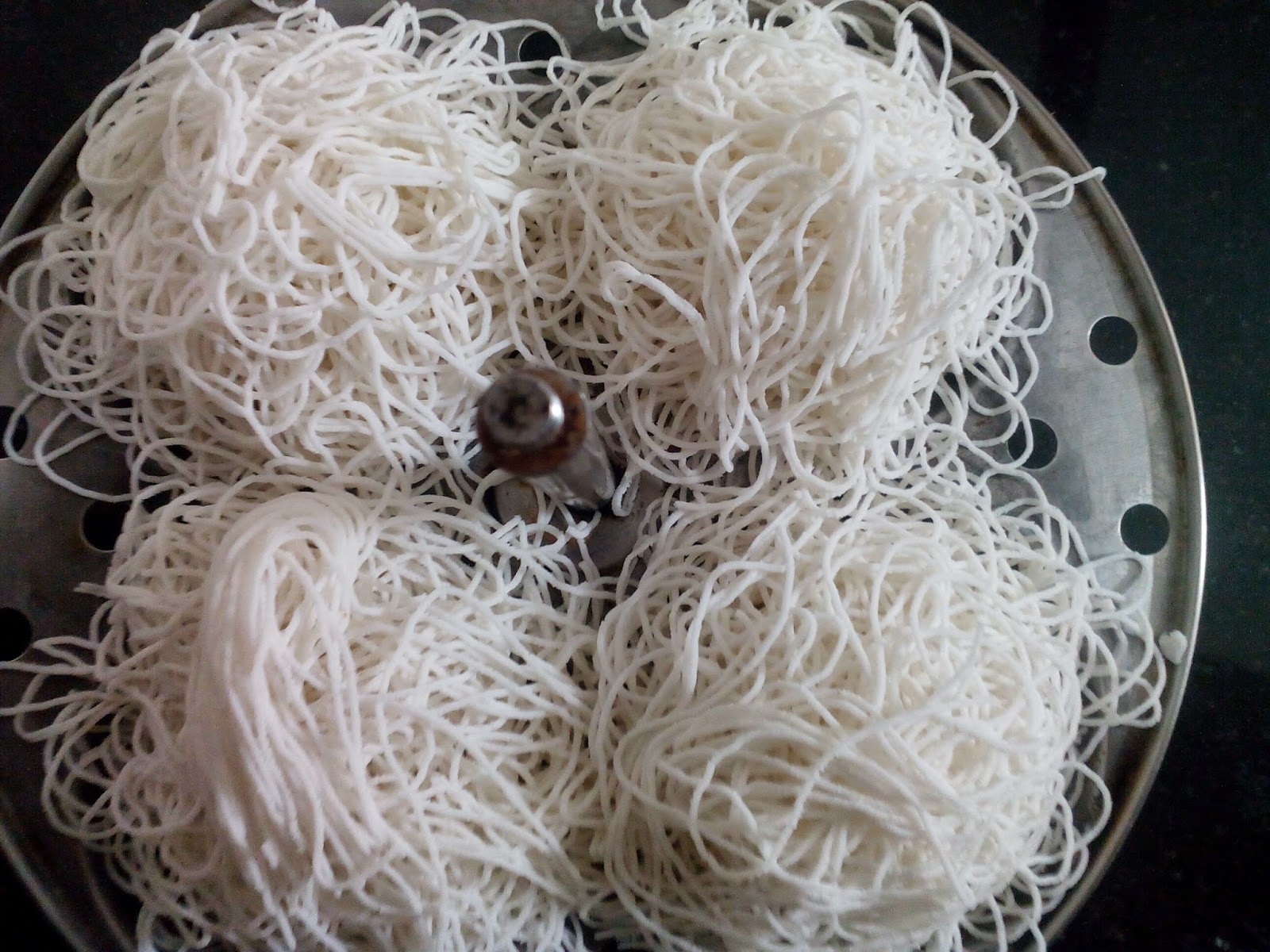 Idiyappam - Rice flour pressed into noodles and steamed | Swaadhmantra ...