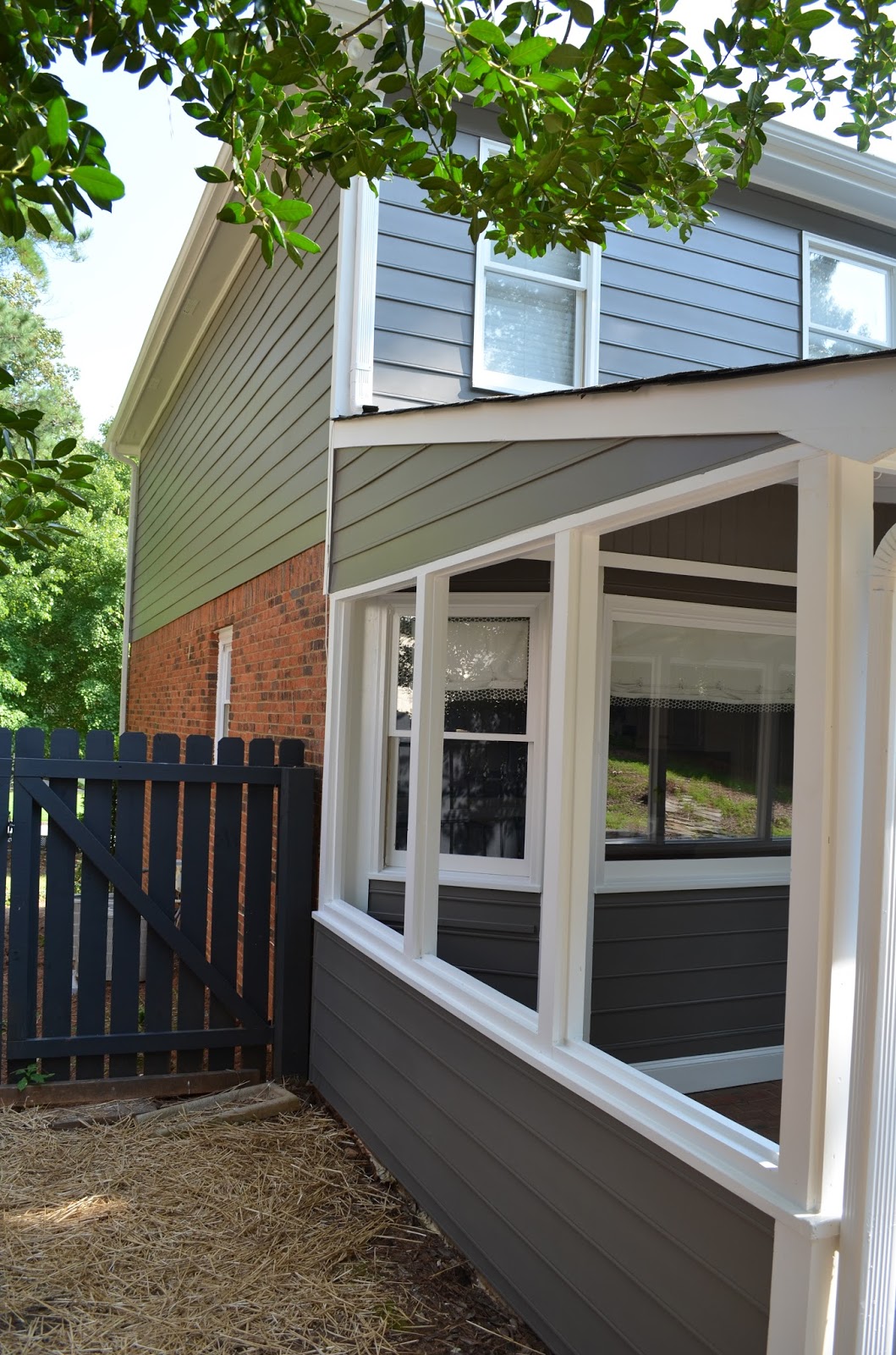 The Houston House: Gauntlet Gray Siding