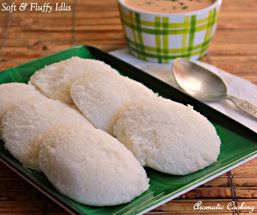 Aromatic Cooking: Soft And Fluffy Idlis ( Steamed Rice Cakes )