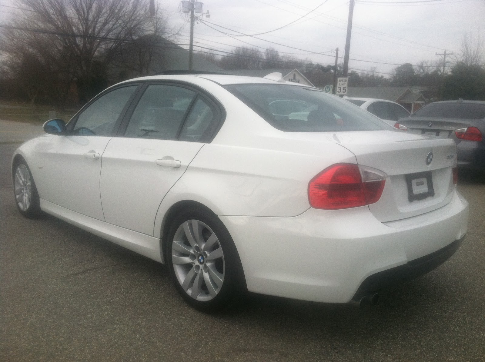 ES INC: 2006 BMW 325I-WHITE/BLACK-60K, 16999.99