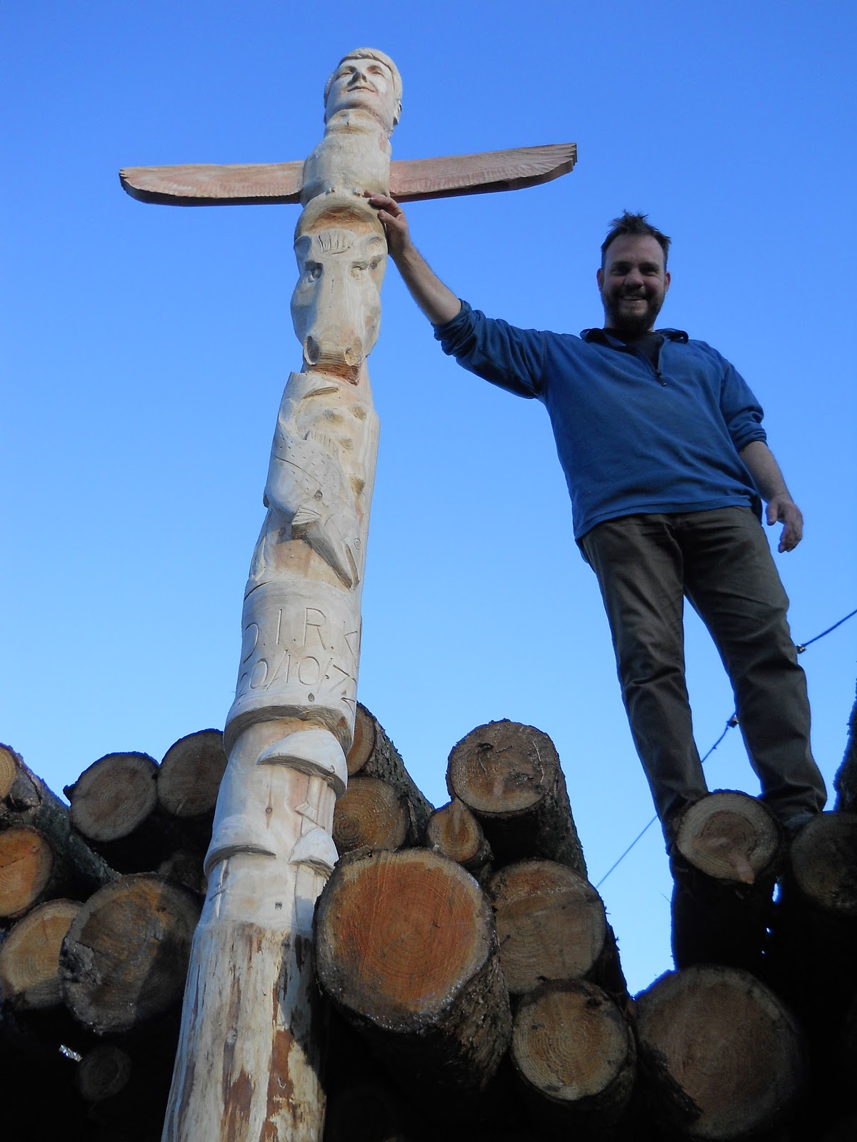 A totem pole and a sign | Carvings with Stories: a blog about woodcarving