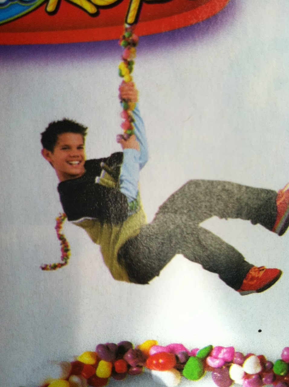 OFFICIAL TAYLOR LAUTNER FAN PAGE: Old/New Taylor nerds rope ad 2006