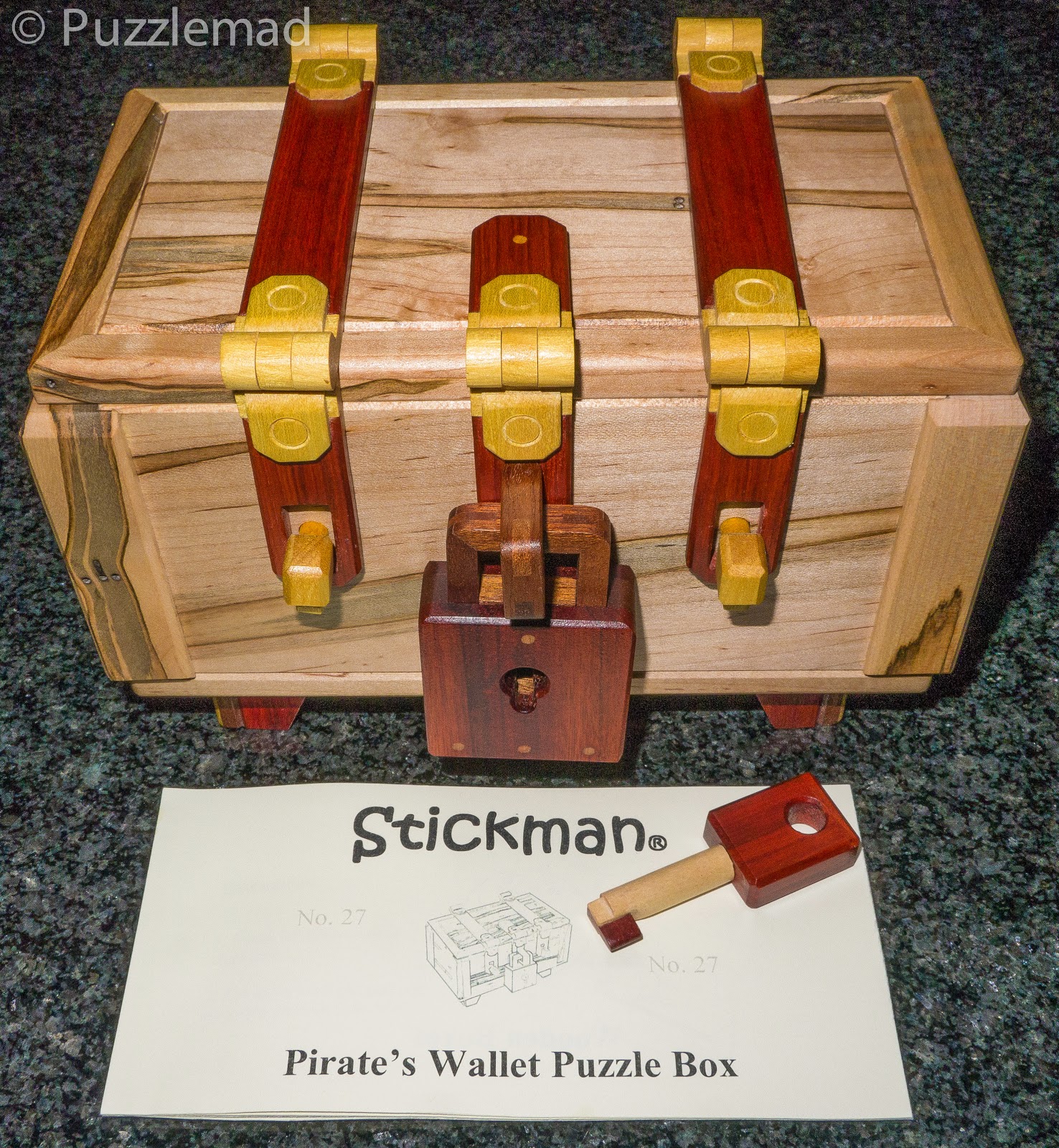 PuzzleMad: Not a box! A sequential discovery puzzle with a cavity!