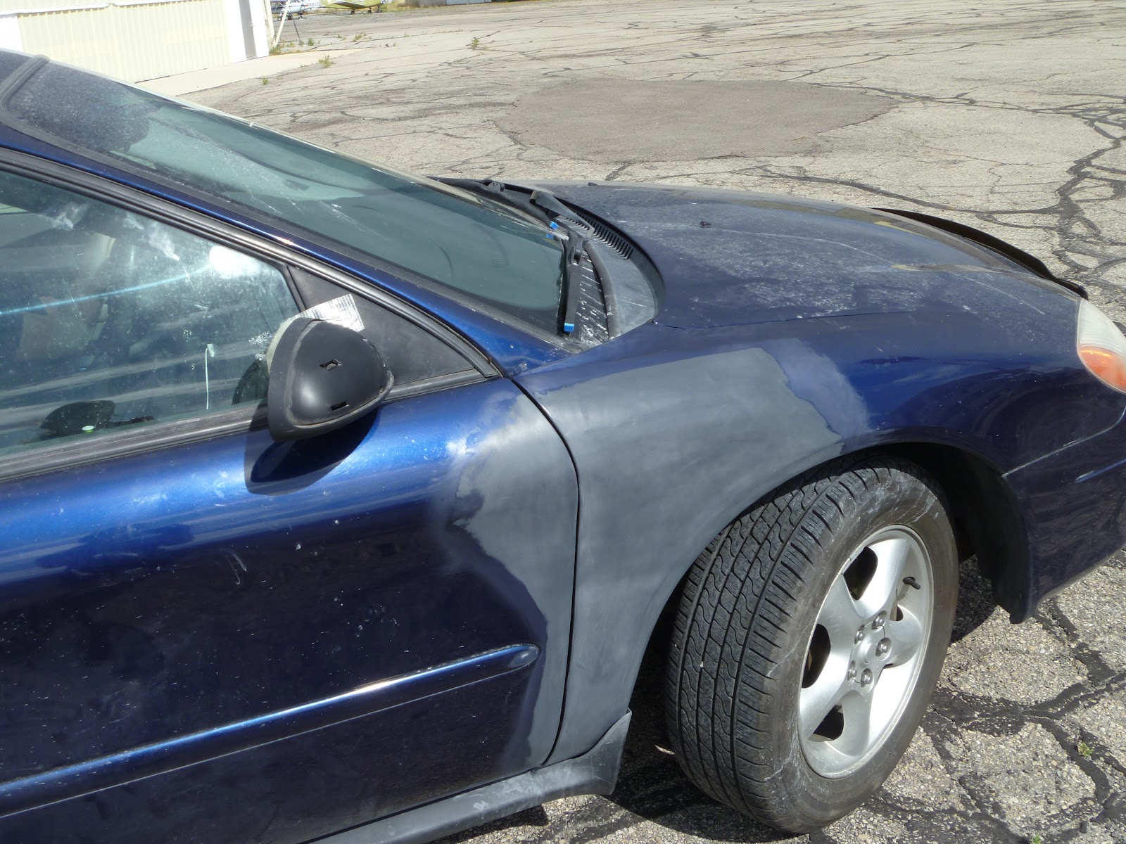 Growing tall in our little Corner: Fixing my dented fender