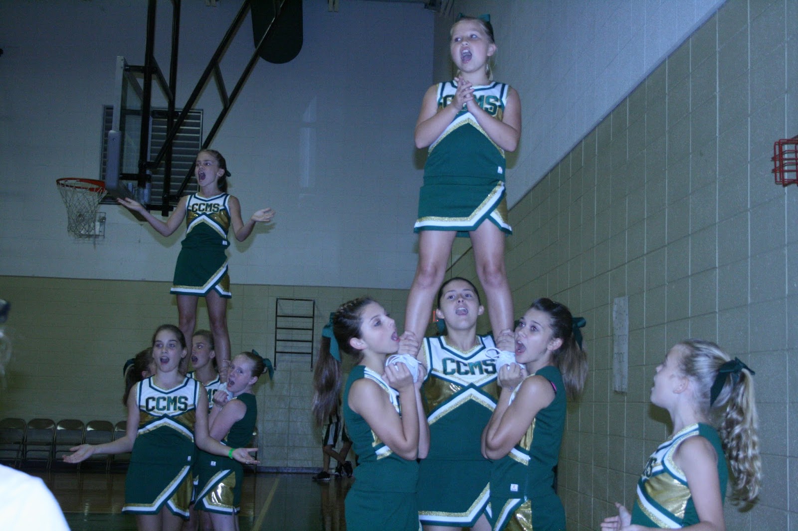 A Look Inside CCMS: CCMS CHEERLEADERS CHEER ON THE LADY PANTHERS