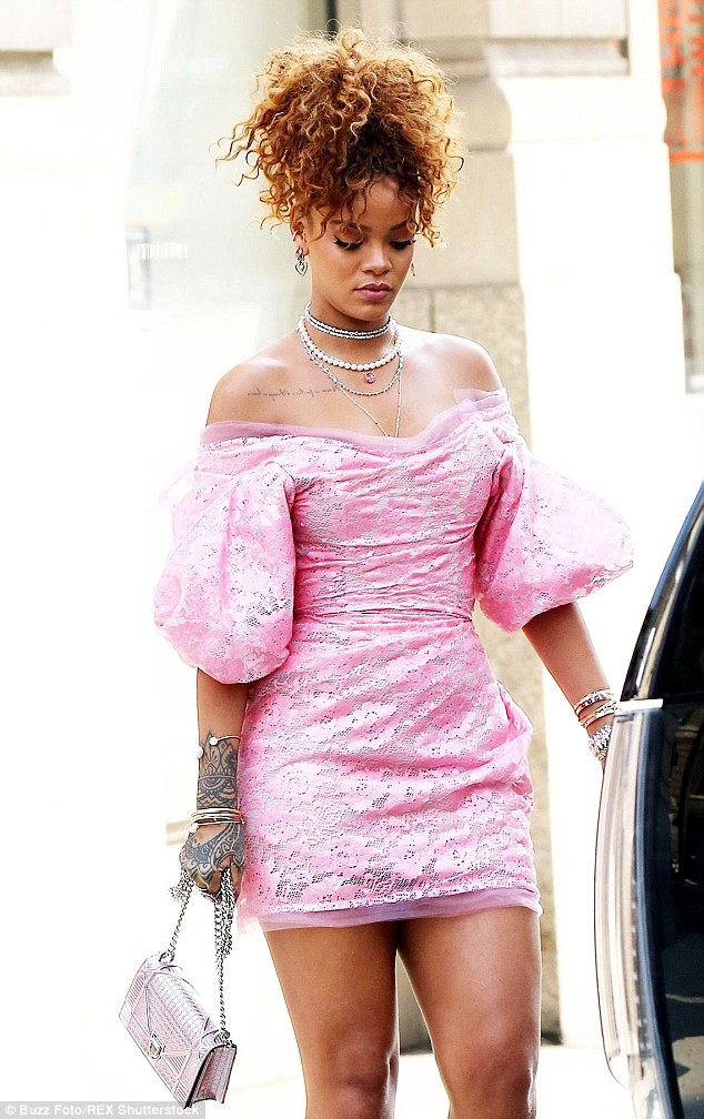Photos: Rihanna steps out in pink 80s dress