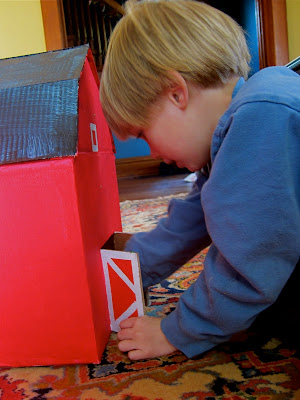 A Little Red Cardboard Barn