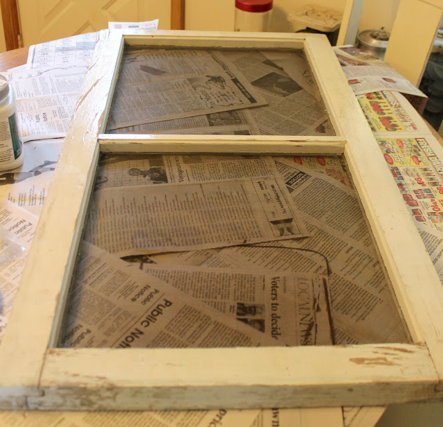 A Stenciled Window Screen with Old Sign Stencils - Organized Clutter