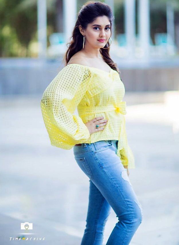 Telugu Actress Surbhi Photo Shoot In Yellow Top Blue Tight Jeans - Noshwind