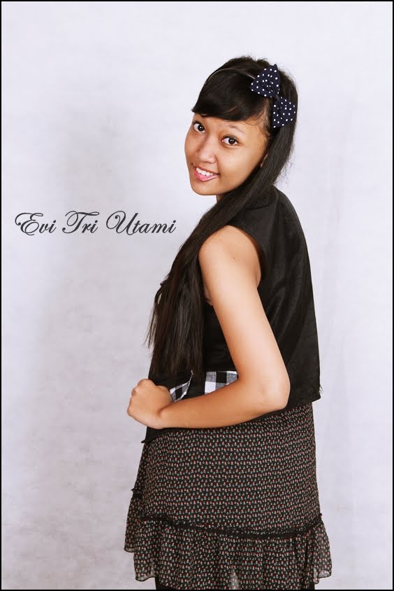 Tentang Evi Tri Utami