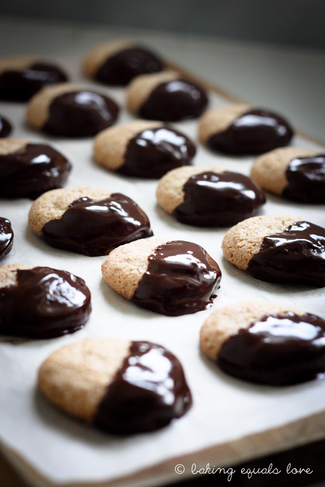 baking = love: Paper Anniversary: Chocolate dipped amaretti cookies