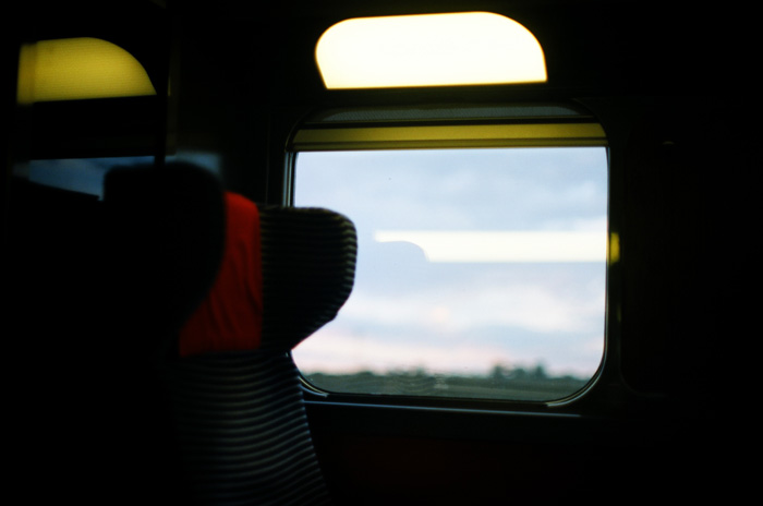 On My Way: Sunset through a train window