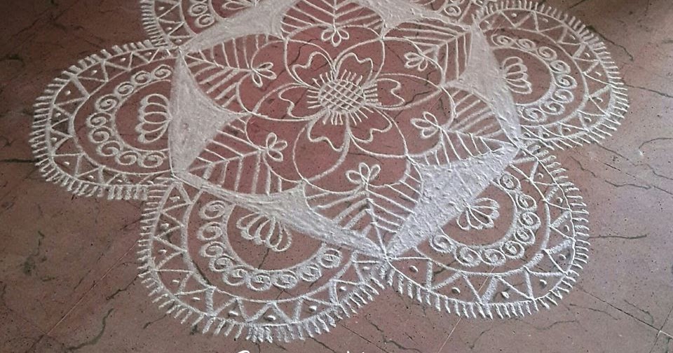 CHODAVARAMNET: SIX ANGLED WHITE RANGOLI ART