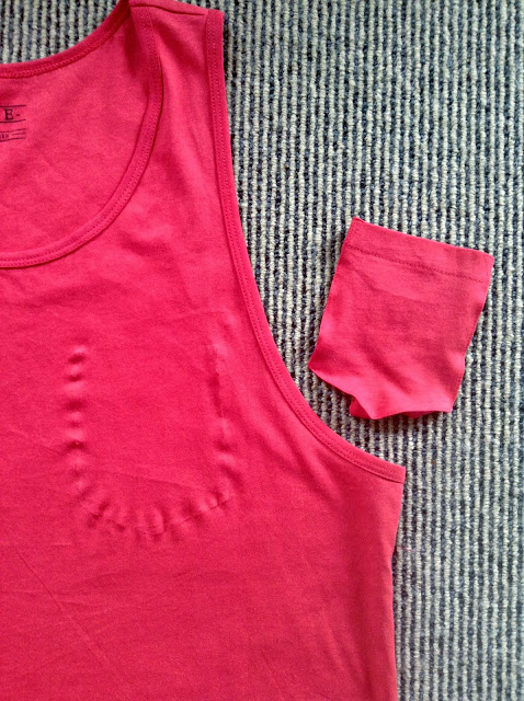 Salute to Cute: Contrast pocket singlet with embroidered message