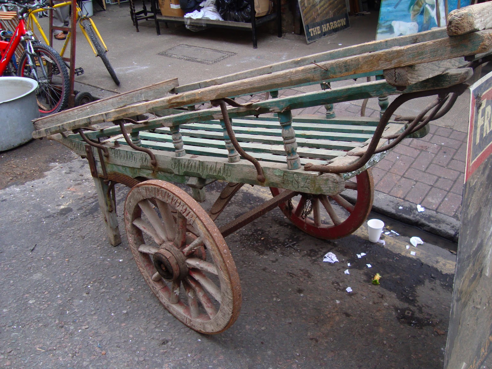 the rag and bone man: COSTERMONGER'S BARROW.