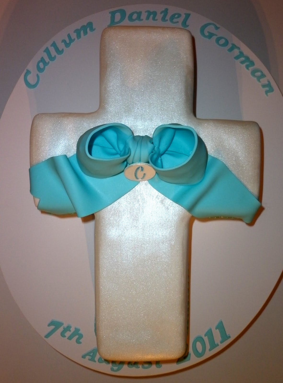Caketopia: Christening Cake for Callum - Cross and Monogram Bow