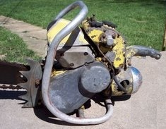 VINTAGE CHAINSAW COLLECTION: CLINTON GROUP OF SAWS.