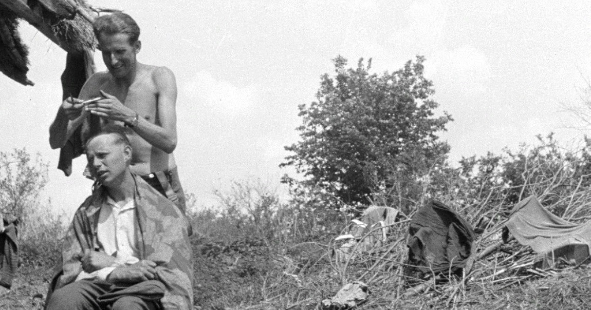 Men of Wehrmacht: Wehrmacht Soldier Receives a Haircut in the Eastern Front