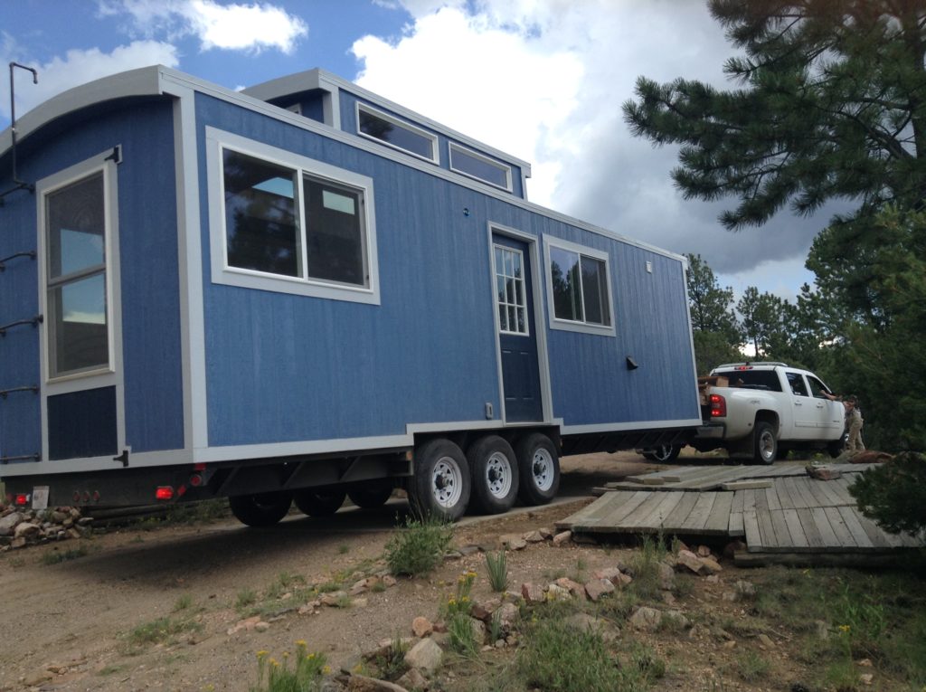 TINY HOUSE TOWN: The Blue Caboose Tiny House (240 Sq Ft)
