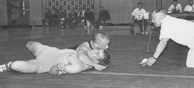 Finished by pin: Black and white wrestling