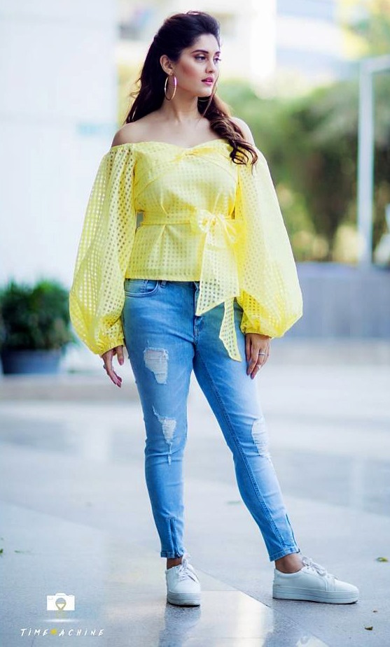 Telugu Actress Surbhi Photo Shoot In Yellow Top Blue Tight Jeans - Noshwind