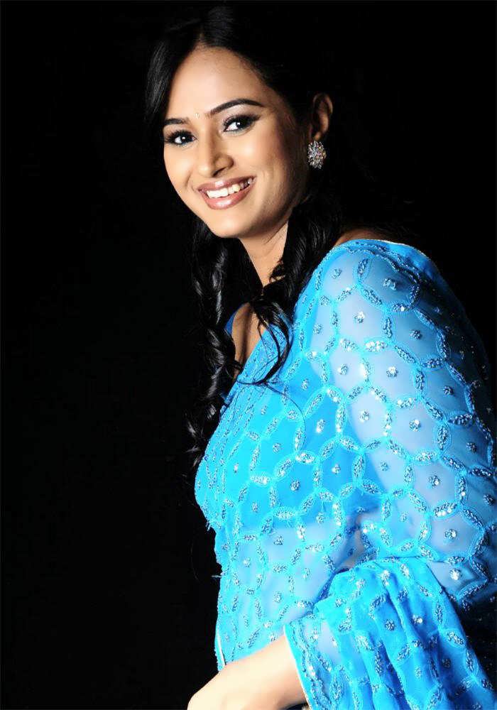 Actress Singer Anupama Romantic Blue Saree Stills