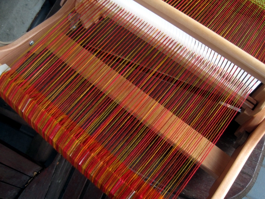Weaving, in green and orange