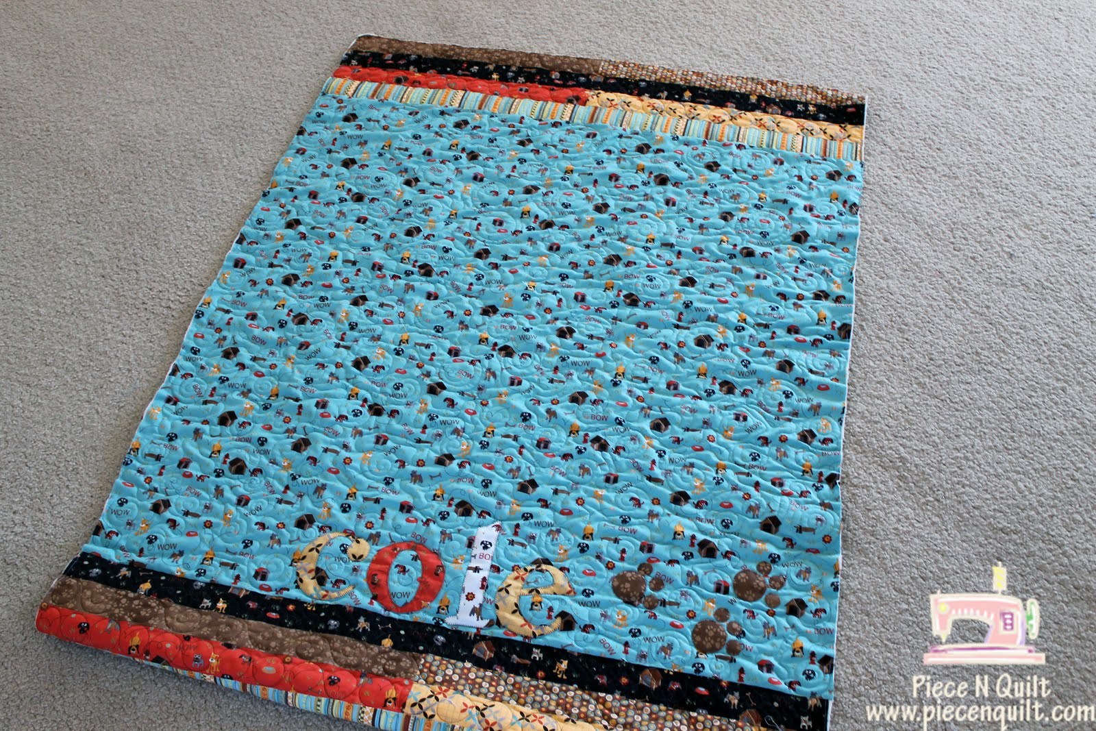 Piece N Quilt: Dog Bones {a baby boy quilt}
