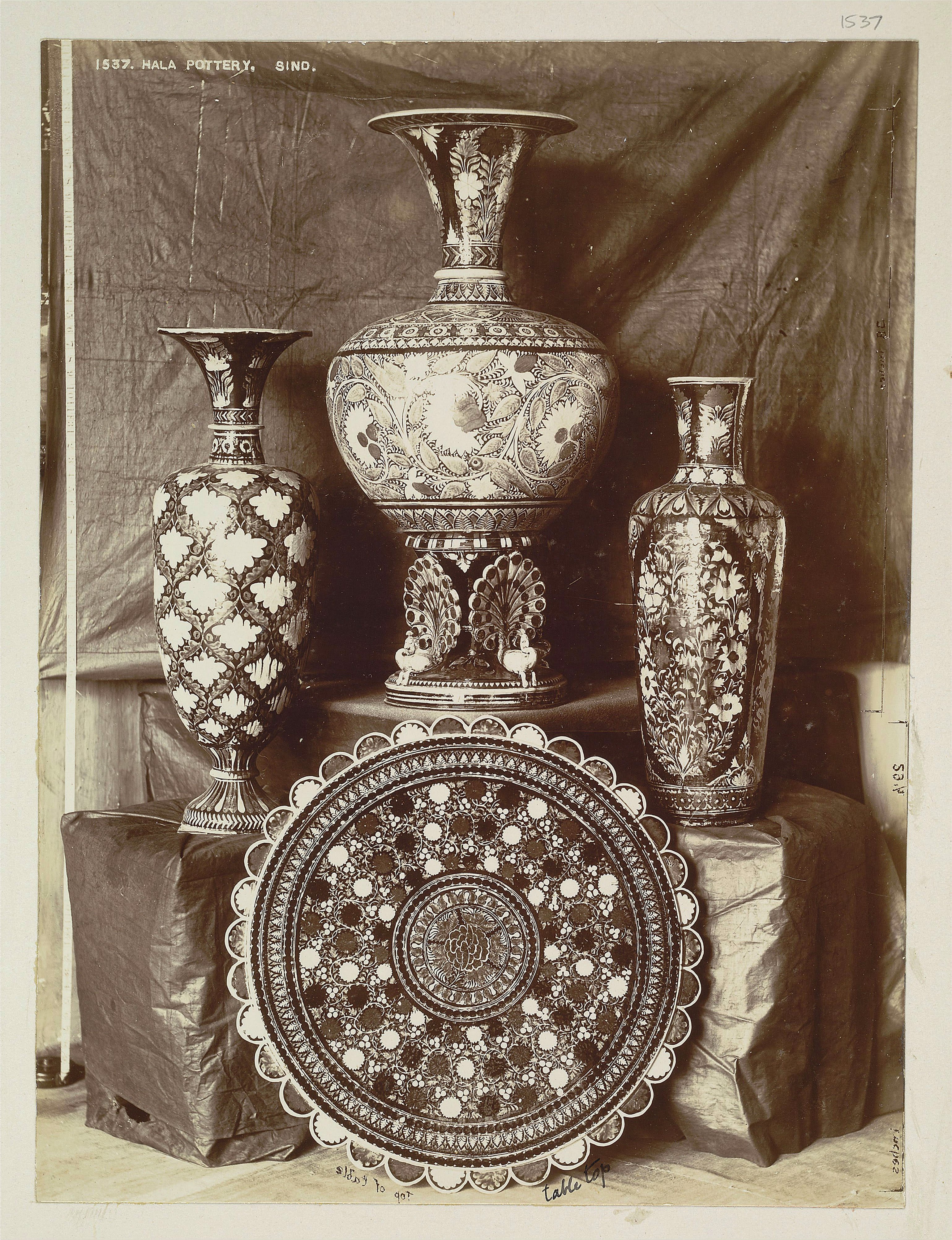 A Potter from Hala near Moro in Sindh with examples of Hala Pottery ...