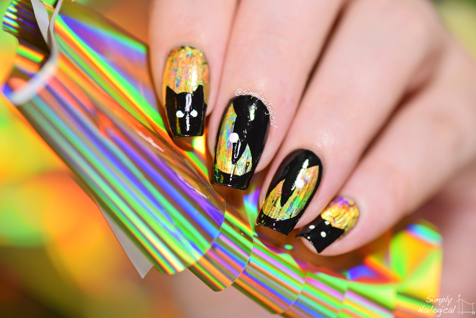 Simply Nailogical: Glowing holographic cat eyes