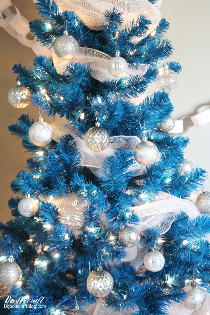 Silver Star Tree Topper on Blue Christmas Tree with Cricut Maker