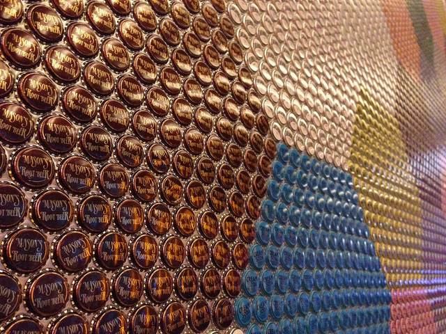 How to Recycle: Bottle Cap Design on Table, Floor and Walls