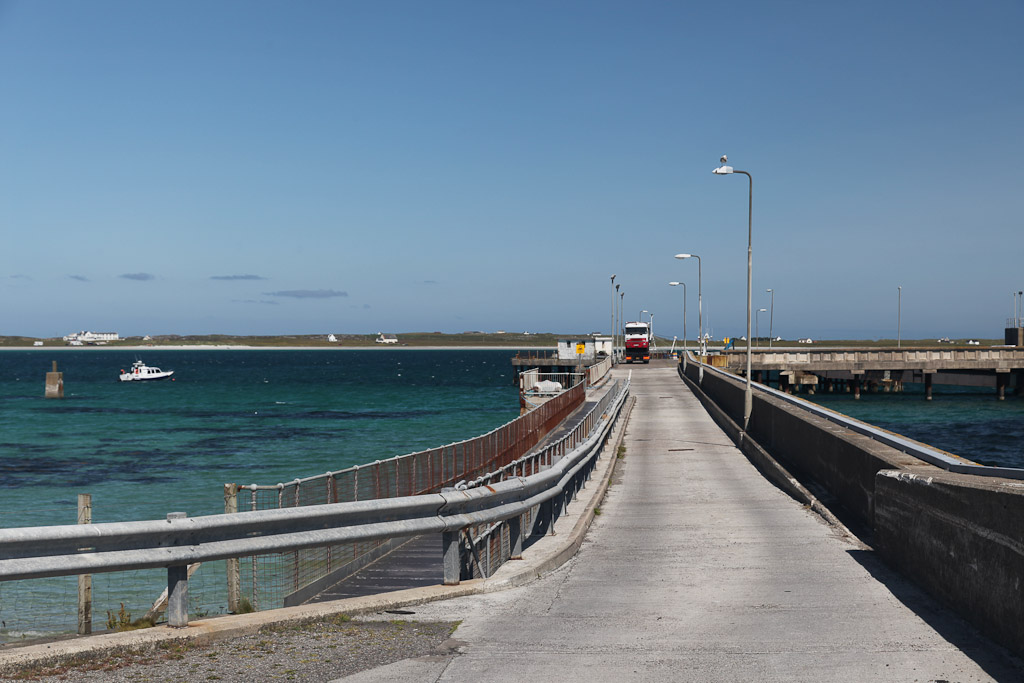 Sea kayaking with seakayakphoto.com: Well composed on Gott Bay pier, Tiree.