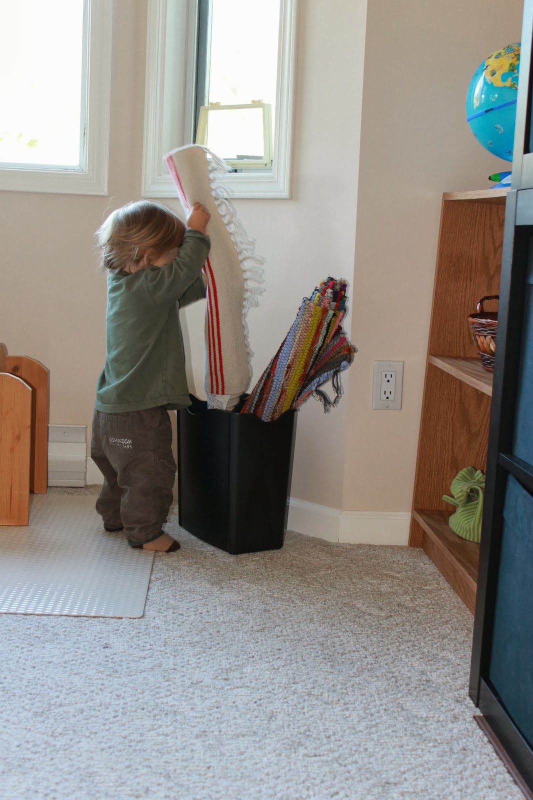 Montessori Beginnings: Montessori Shelves and Using a Work Mat