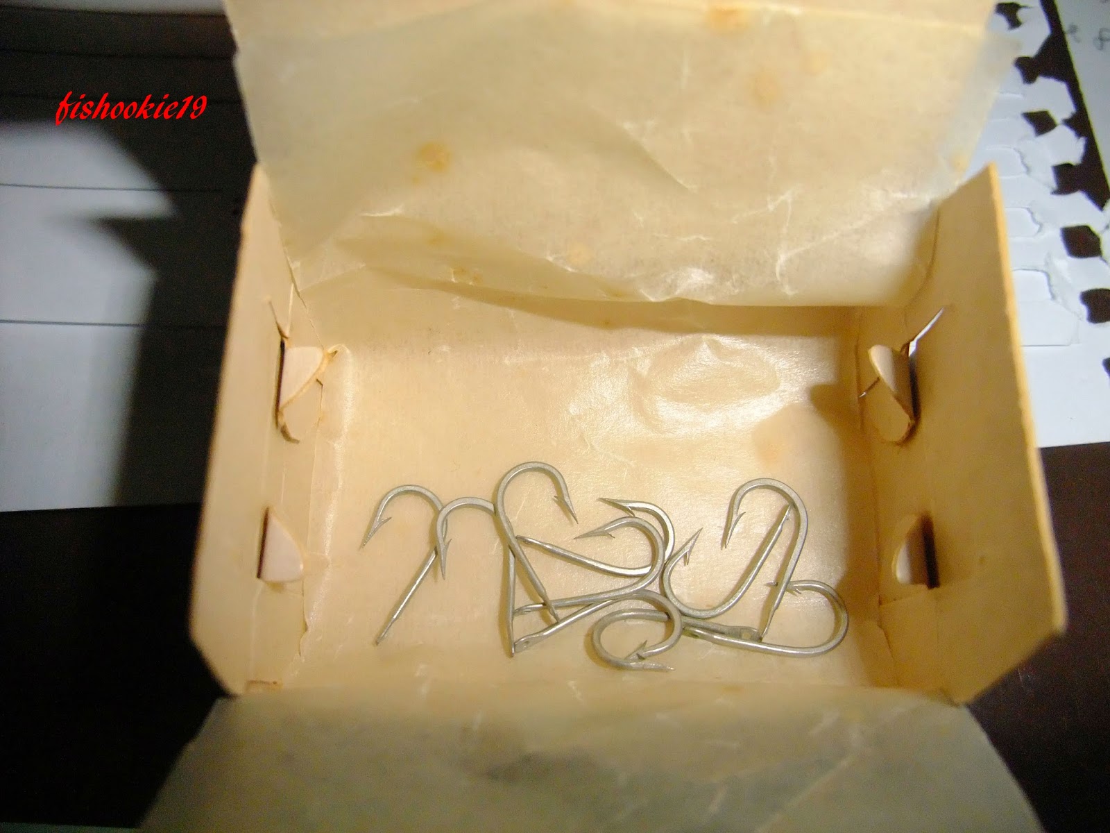 Old Mustad brand's fish hooks.