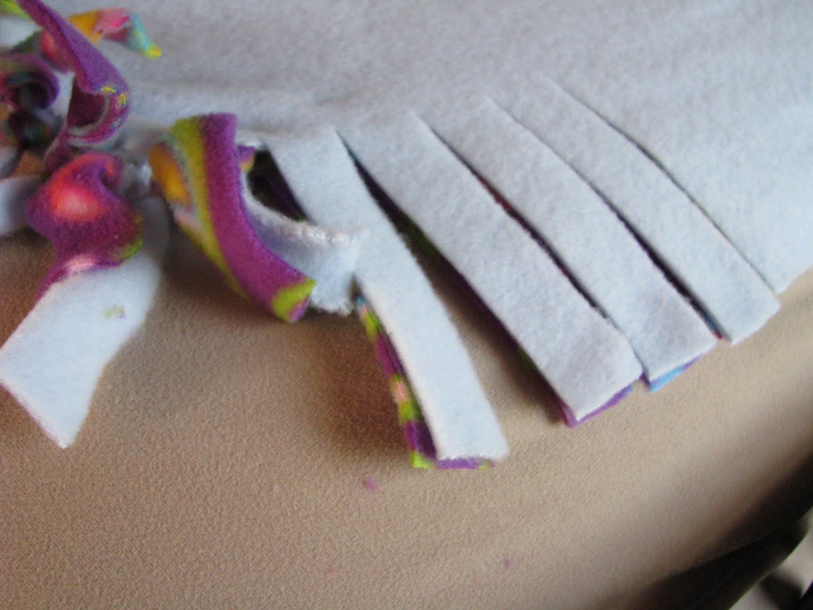 scratch-made wife: Freestyle Friday: How to Make a Fleece Knot Blanket